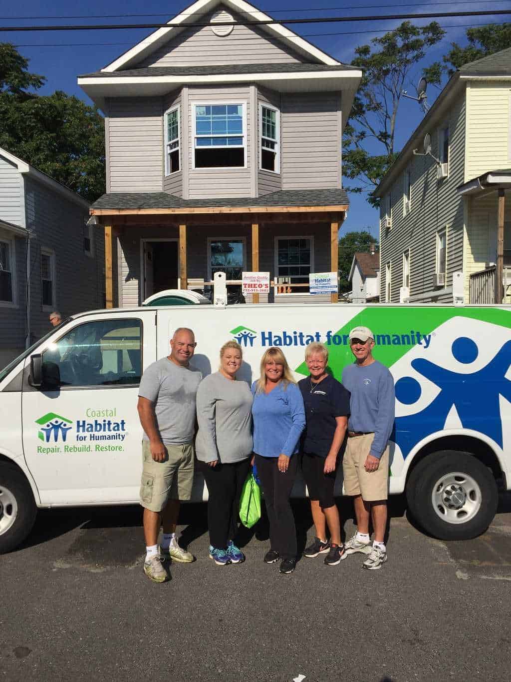 Bankers Build Program Brings 50 Sandy Victims Home